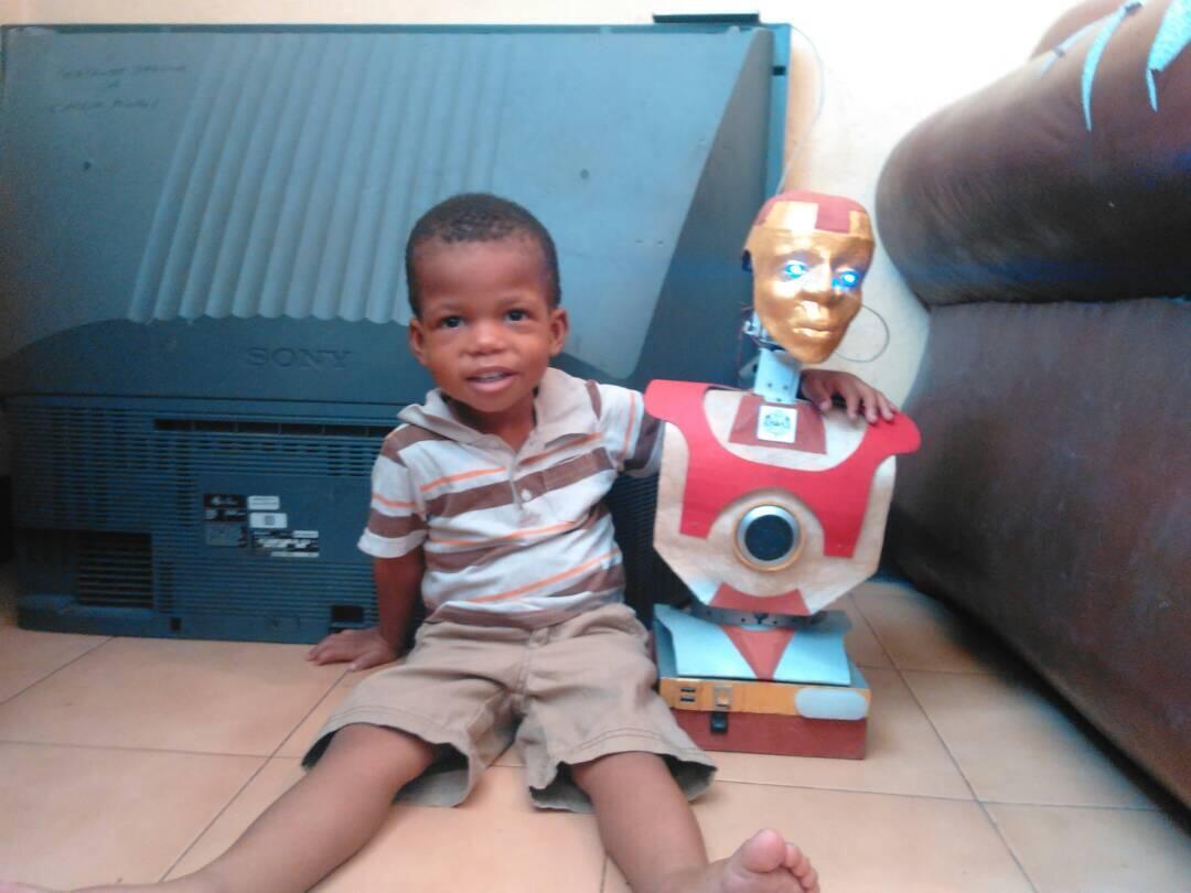 A Haitian father makes a robot to teach his son to speak