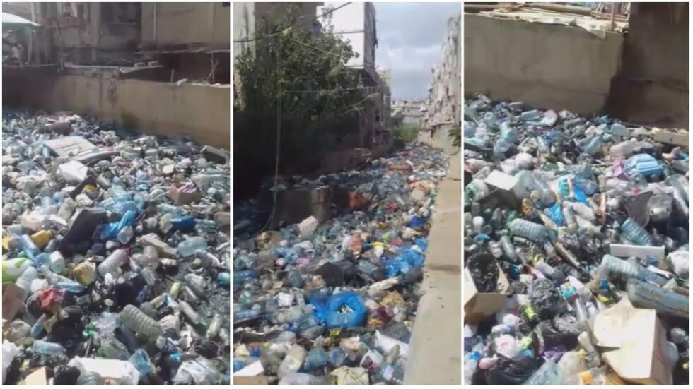 A river of waste runs through a Beirut suburb