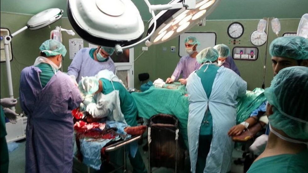Gaza ER doctor: ‘We treat several patients at once, on the same bed’
